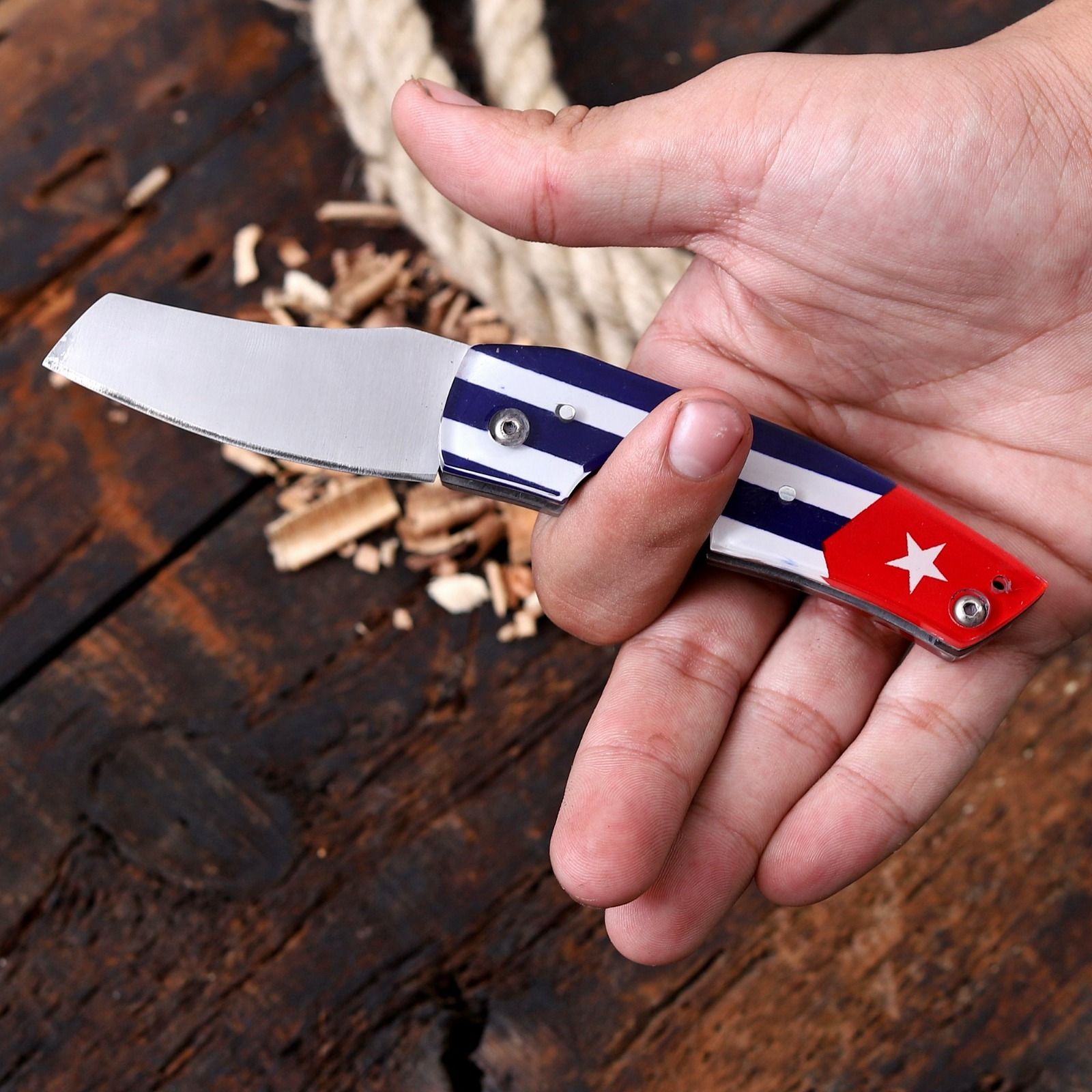 Buy Compact Folding Knife With Star-emblem Resin Handle from AH TRADERS ...
