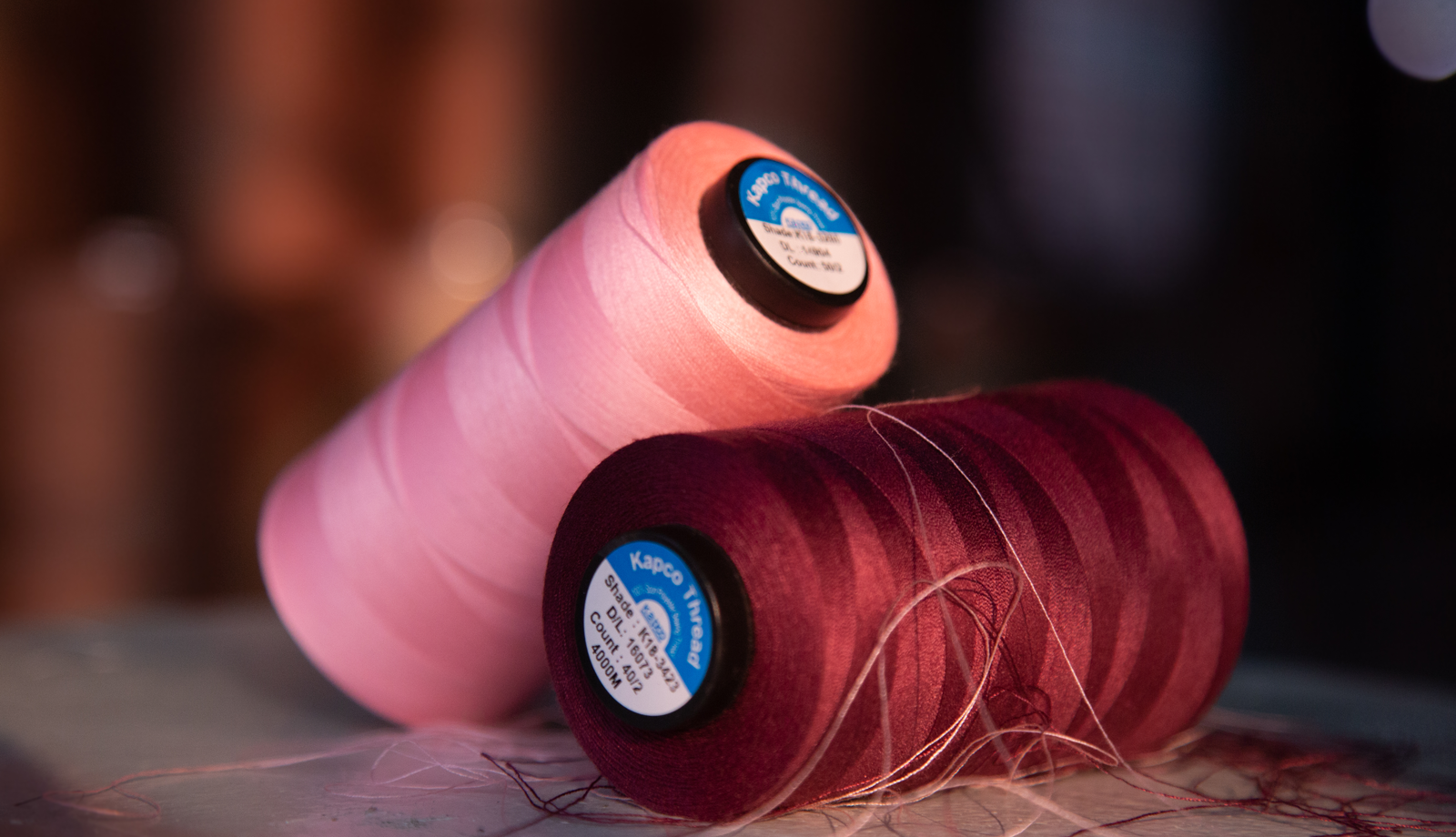 Buy Spun Polyester Sewing Thread from Khan Accessories & Packaging Co ...